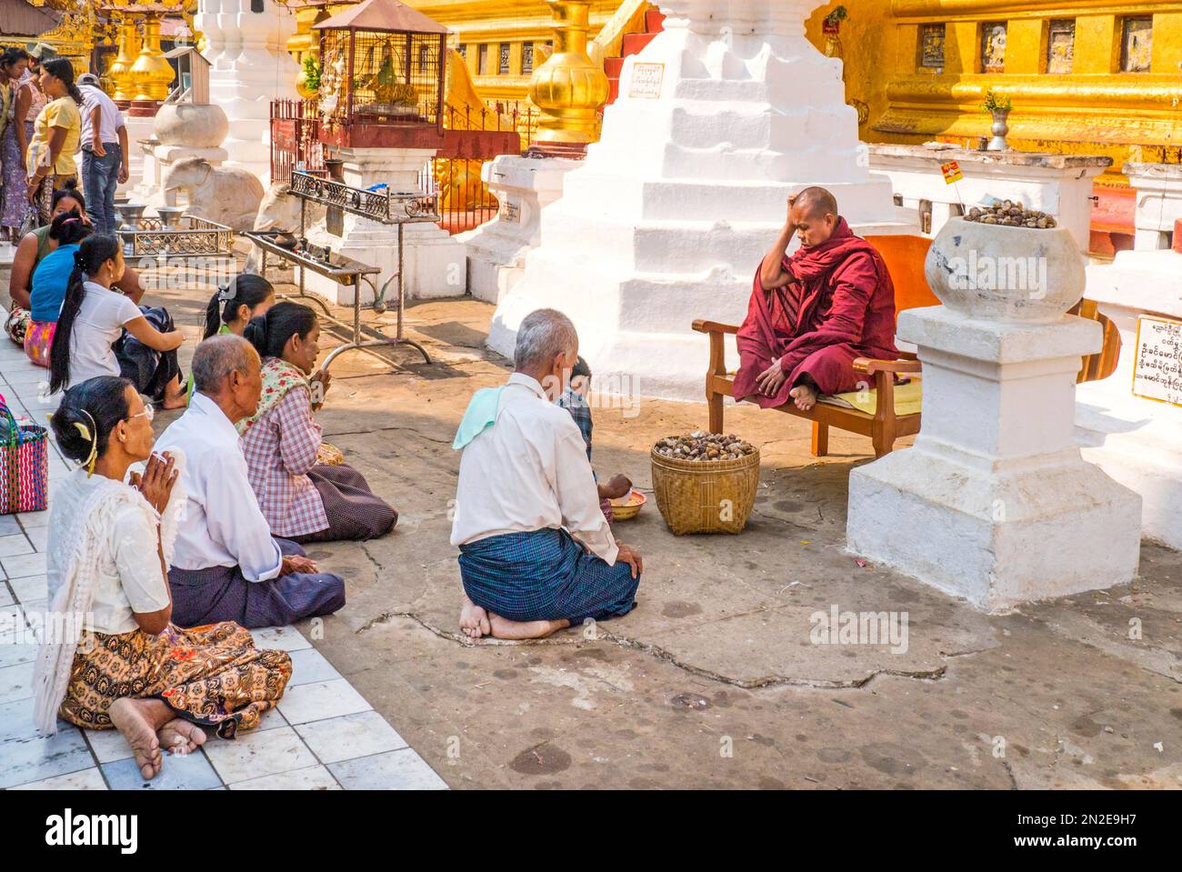 Teaching the faithful by monk in Shwezigon Pagoda, Bagan, Myanmar Stock ...