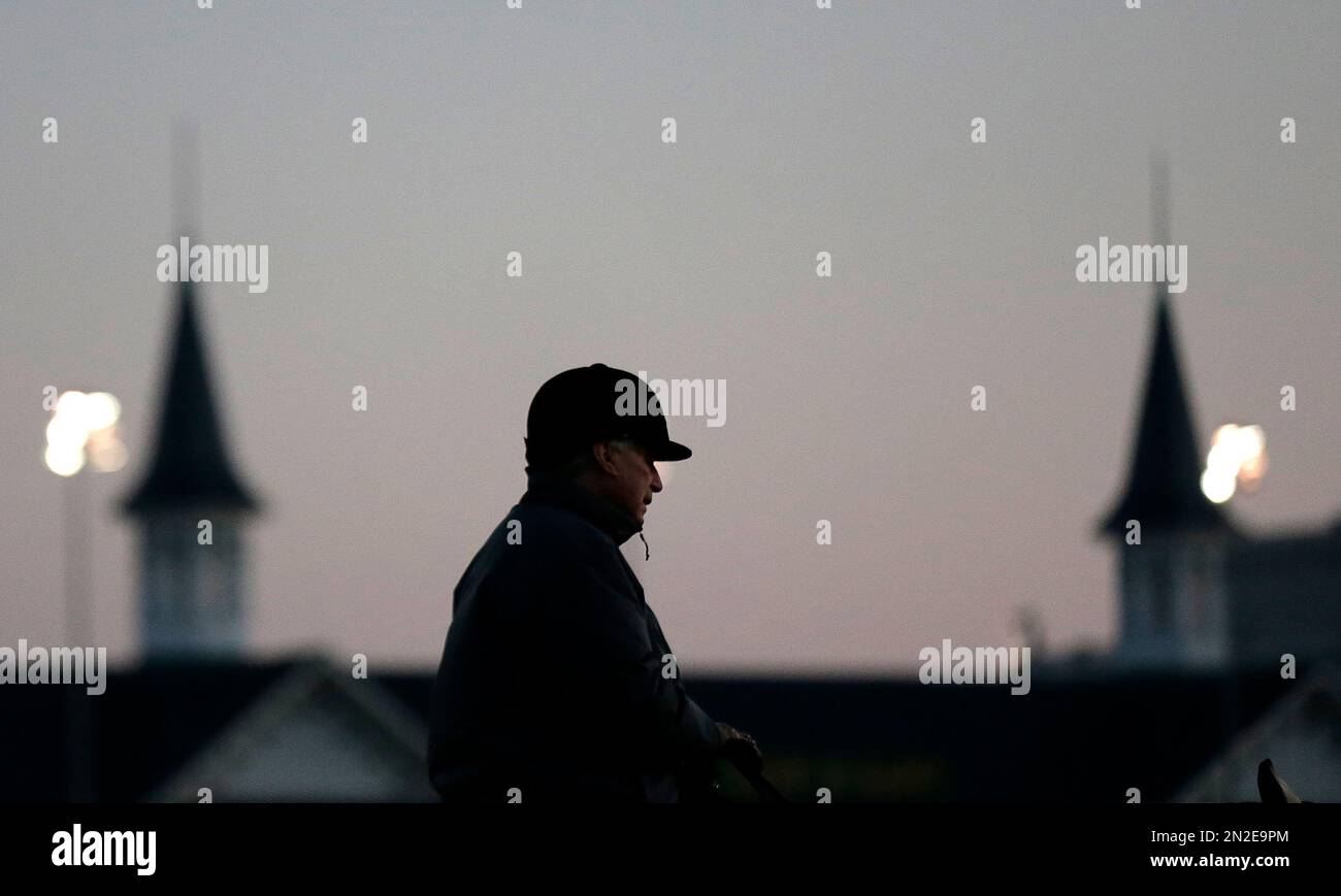 Trainer D. Wayne Lukas watches horses workout at Churchill Downs ...
