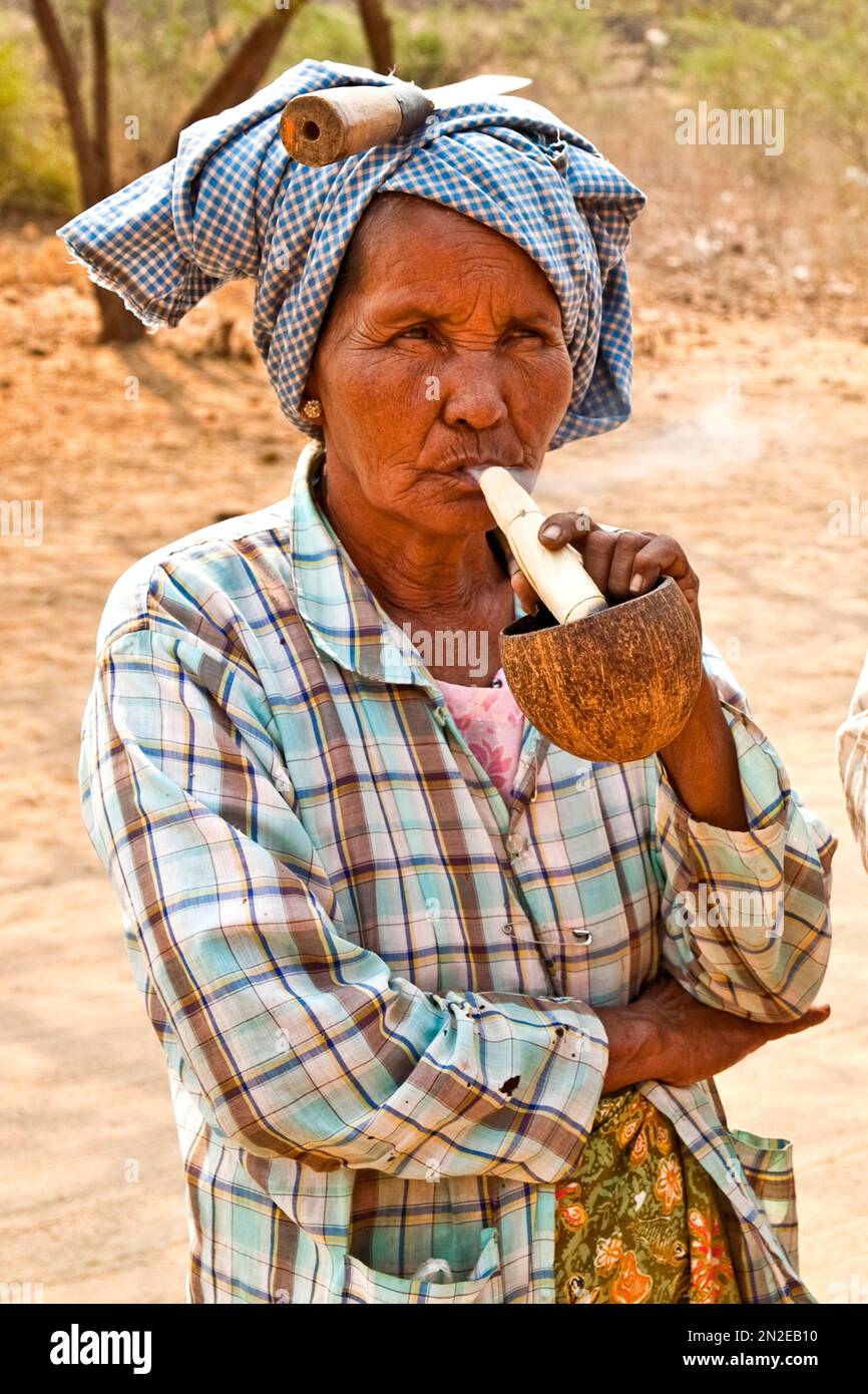 Smoking market visitor from the surrounding mountain villages, farmers ...