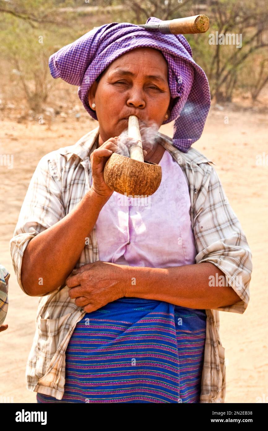 Smoking market visitor from the surrounding mountain villages, farmers ...