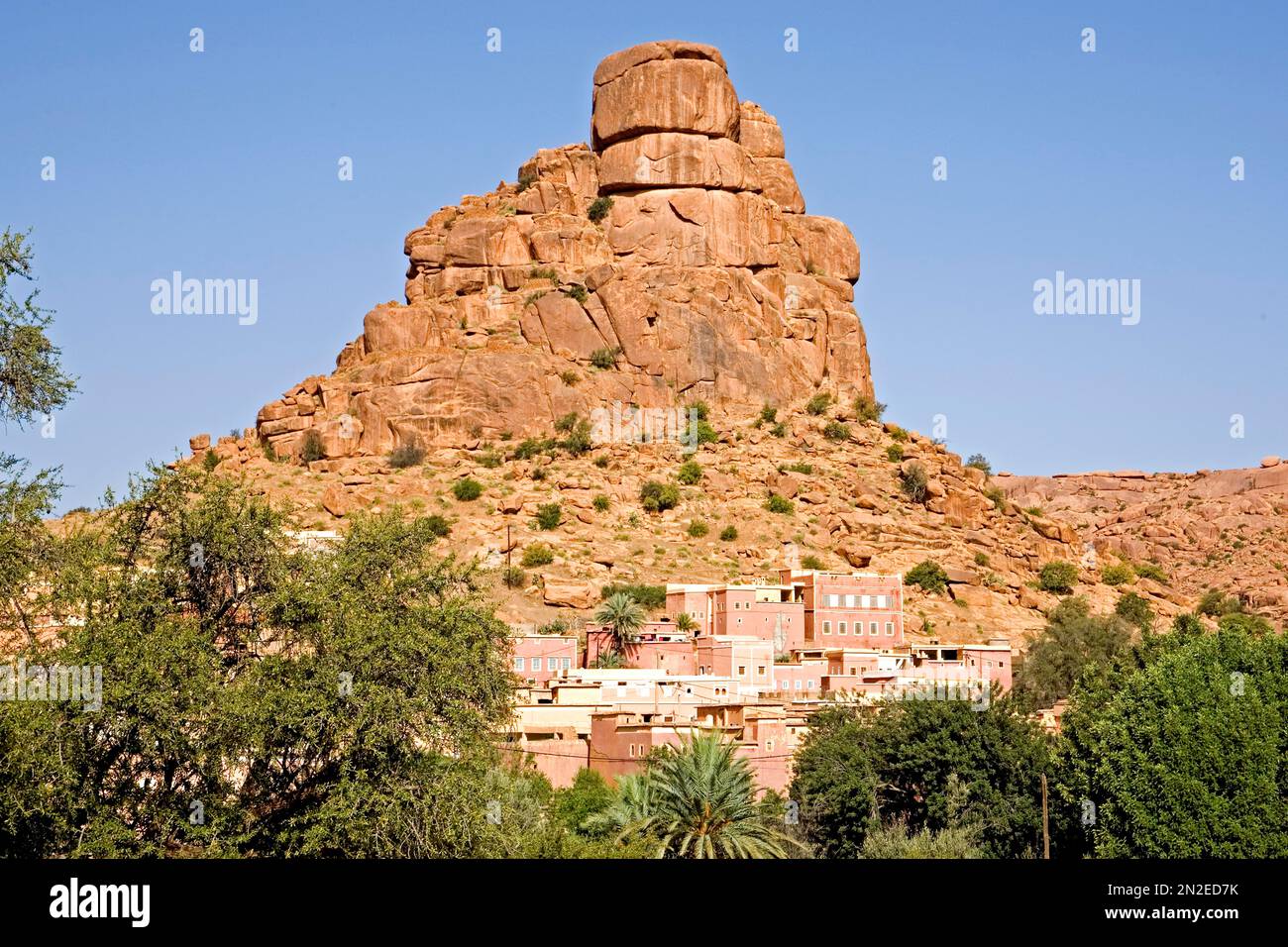 Village in front of bizarre granite rocks, Tafraoute, Morocco Stock ...