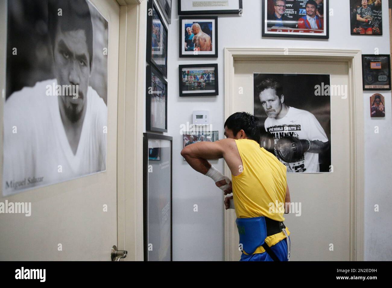 Boxer Manny Pacquiao, of the Philippines, shadow-boxes during his ...