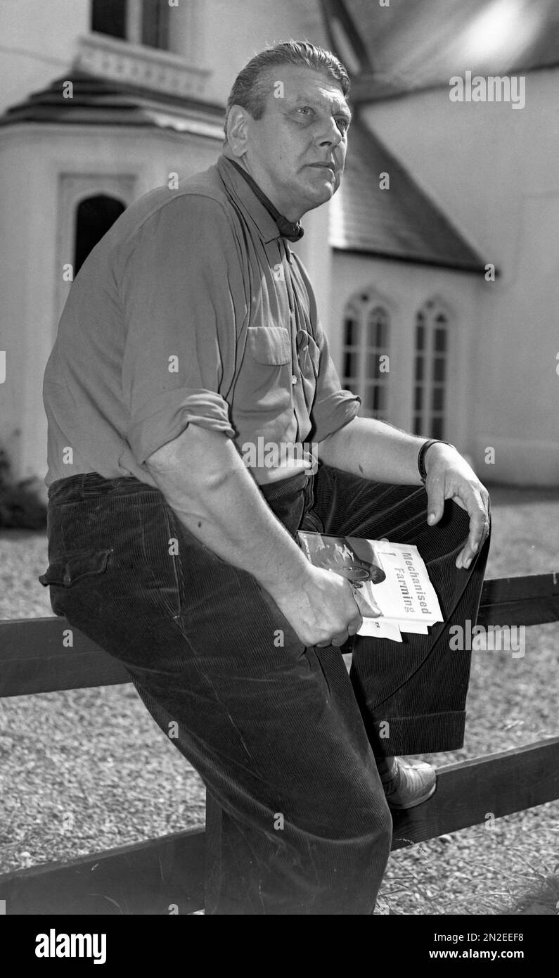 Colonel Otto Skorzeny, a former S.S. parachutist relaxes on a fence in ...