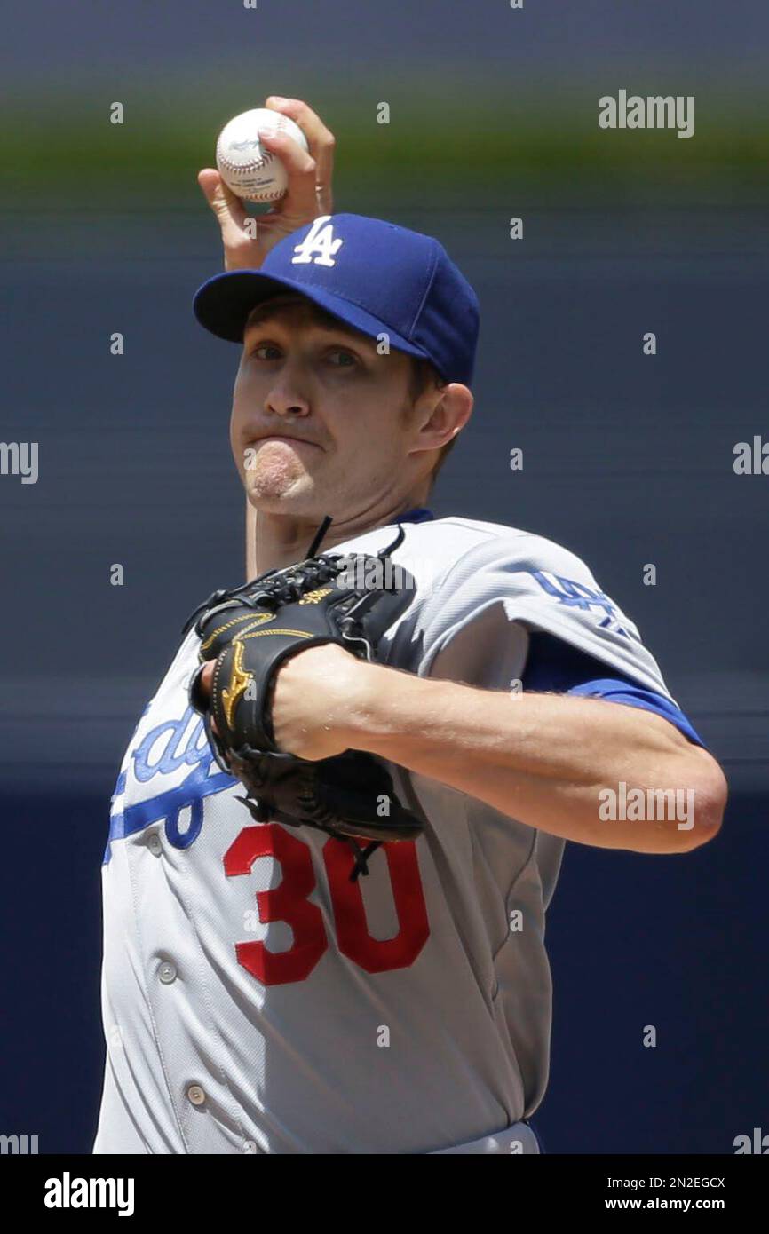 Los Angeles Dodgers starting pitcher Scott Baker pitches to a San Diego ...