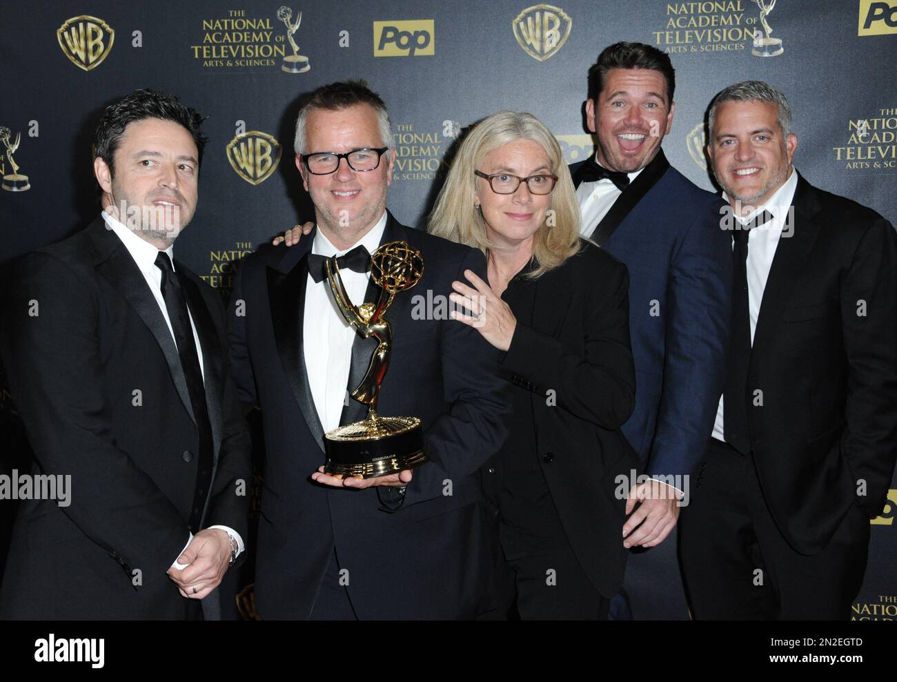The crew of “The Ellen DeGeneres Show” poses in the pressroom with the ...