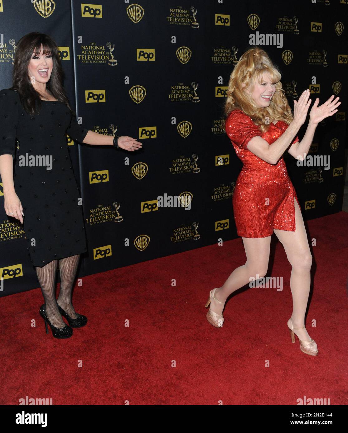 Marie Osmond, left, and Charo pose in the pressroom at the 42nd annual ...