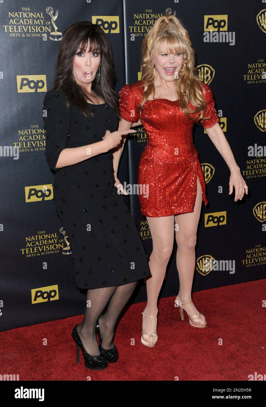 Marie Osmond, left, and Charo pose in the pressroom at the 42nd annual ...