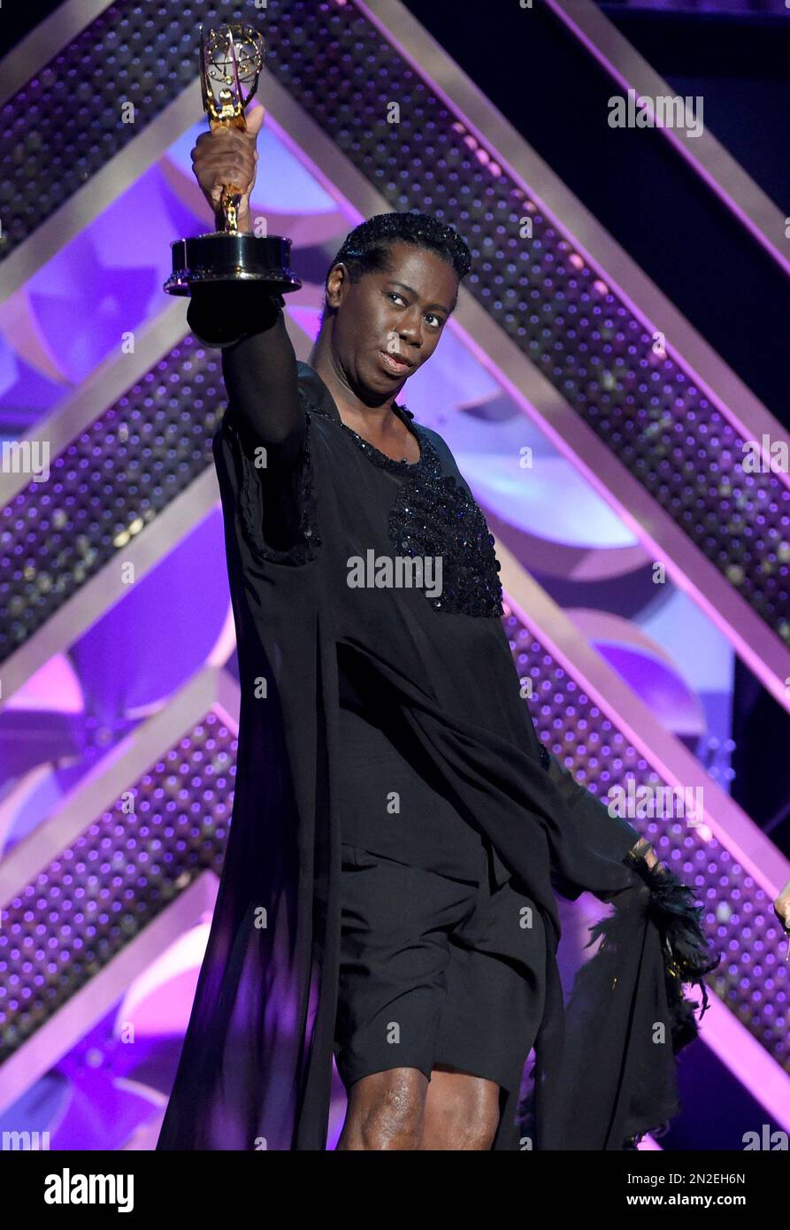 J. Alexander holds an Emmy as he models on stage at the 42nd annual ...