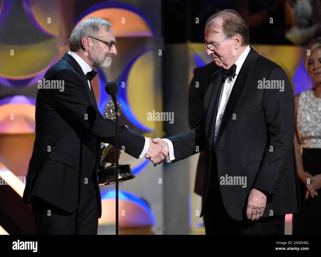 Rand Morrison, left, and Charles Osgood accept the award for ...