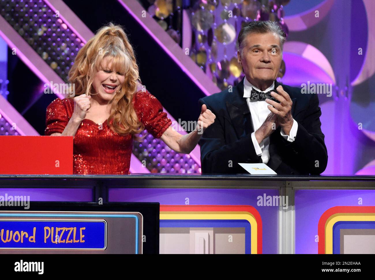 Charo, left, and Fred Willard play Password Puzzle at the 42nd annual ...