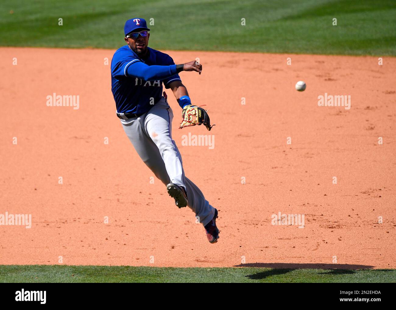 Texas Rangers shortstop Elvis Andrus throws out Los Angeles Angels ...