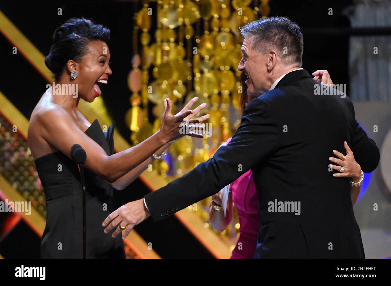 Aisha Tyler, left, presents Craig Ferguson with the award for ...