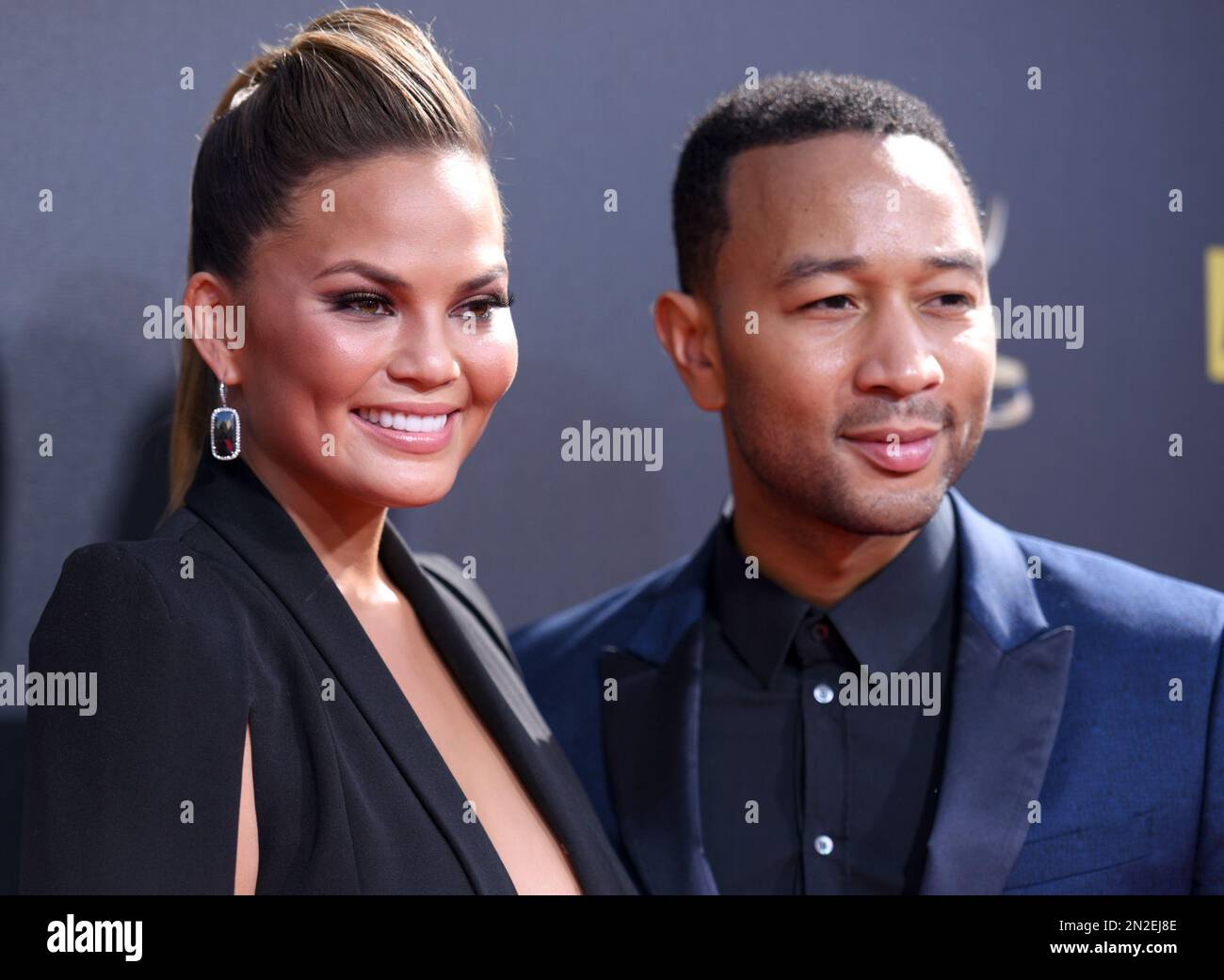 Chrissy Teigen, left, and John Legend arrive at the 42nd annual Daytime ...