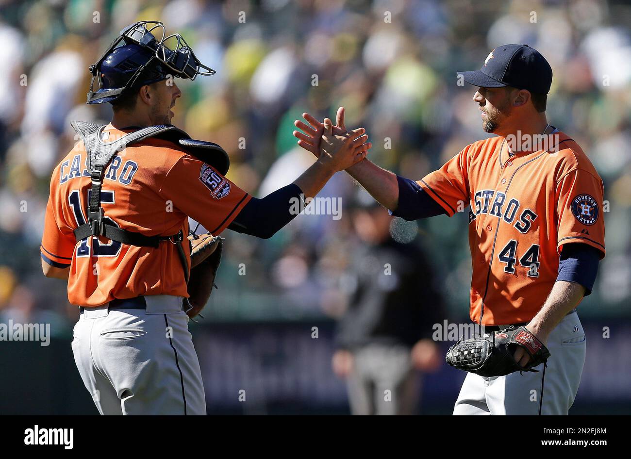 Houston Astros' Luke Gregerson, right, and Jason Castro celebrate their ...
