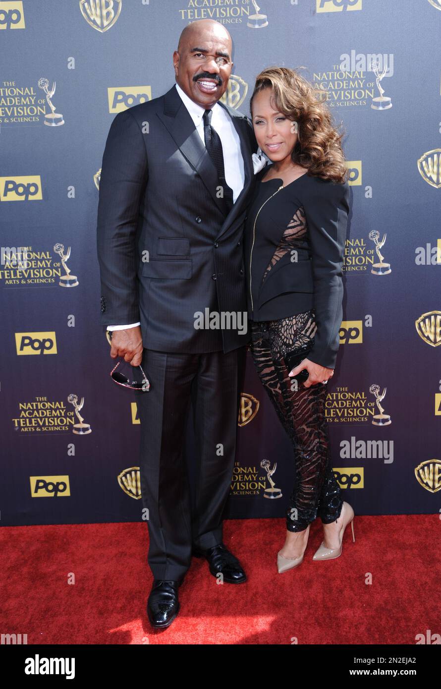 Steve Harvey, left, and Marjorie Bridges-Woods arrive at the 42nd ...