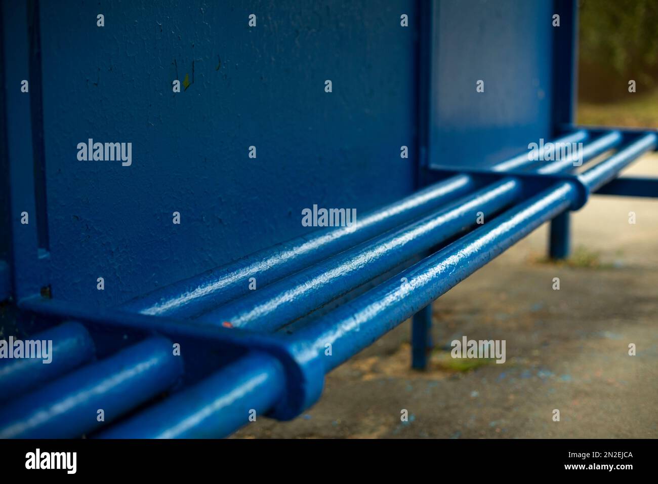 Bus stop in village. Blue bus stop in summer. Transport construction ...