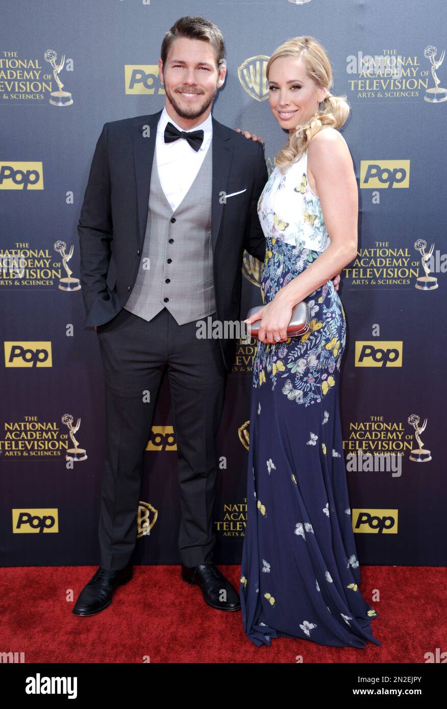 Scott Clifton, left, and Nicole Lampson arrive at the 42nd annual ...
