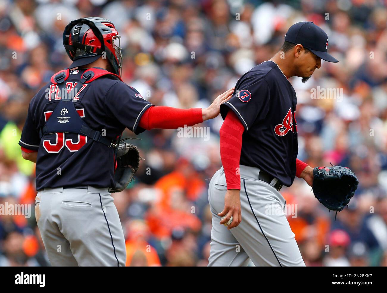 Cleveland Indians catcher Roberto Perez (55) pats pitcher Carlos ...