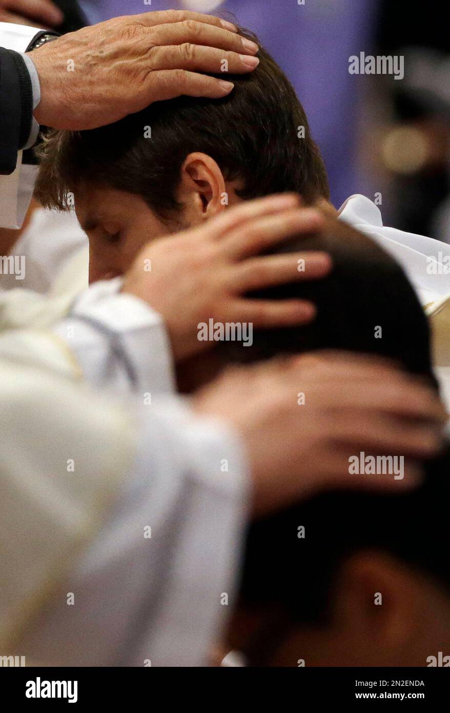 Nineteen new priests are being ordained during a ceremony led by Pope ...