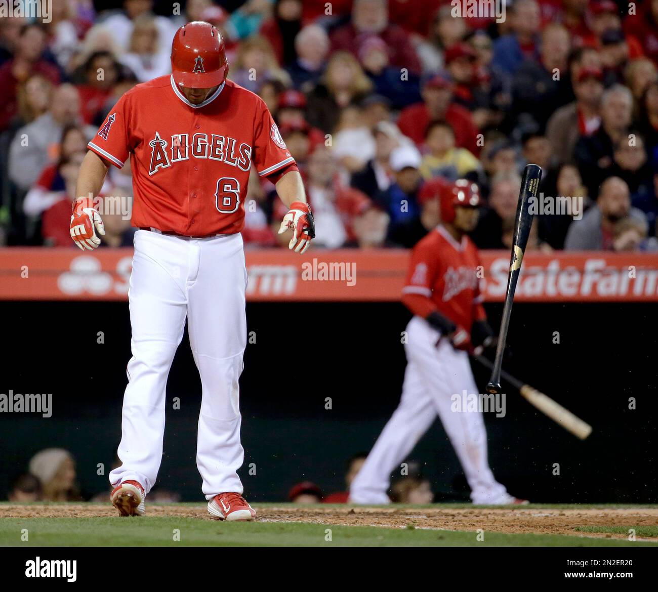 Los Angeles Angels' David Freese slams his bat down after striking out ...