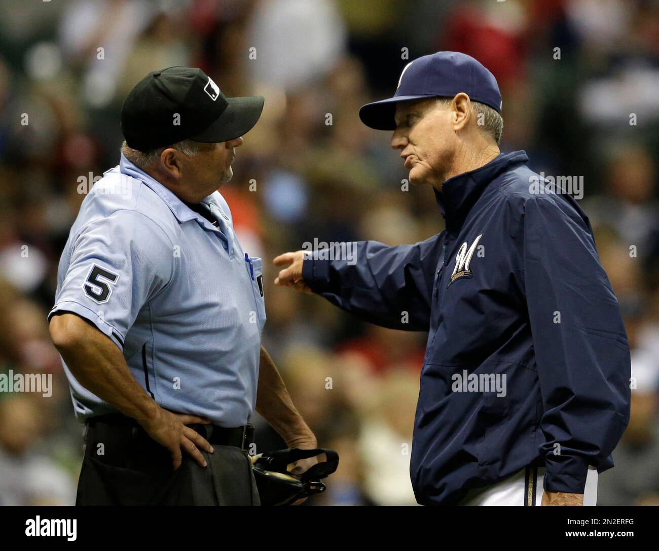 Milwaukee Brewers manager Ron Roenicke argues with home plate umpire ...