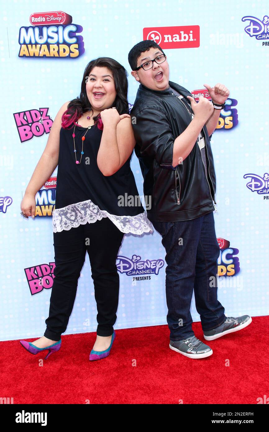 Raini Rodriguez, left, and Rico Rodriguez arrive at the 2015 Radio ...