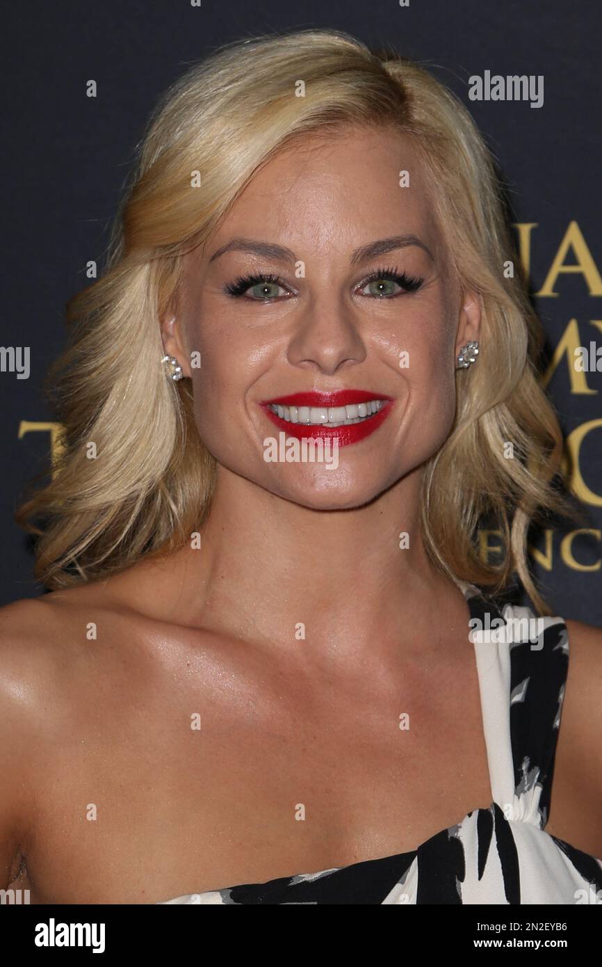 Jessica Collins arrives at the 2015 Daytime Creative Arts Emmy Awards ...