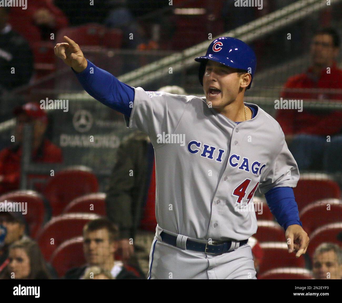 Chicago Cubs' Anthony Rizzo reacts after scoring on a double by ...