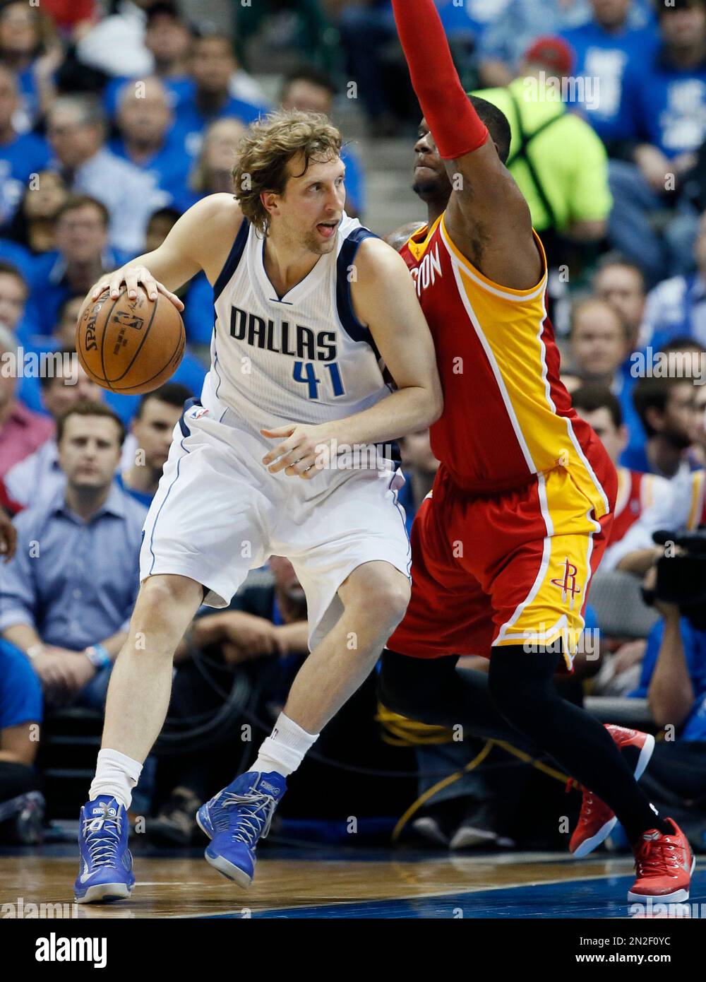 Dallas Mavericks' Dirk Nowitzki (41) is pressured by Houston Rockets ...