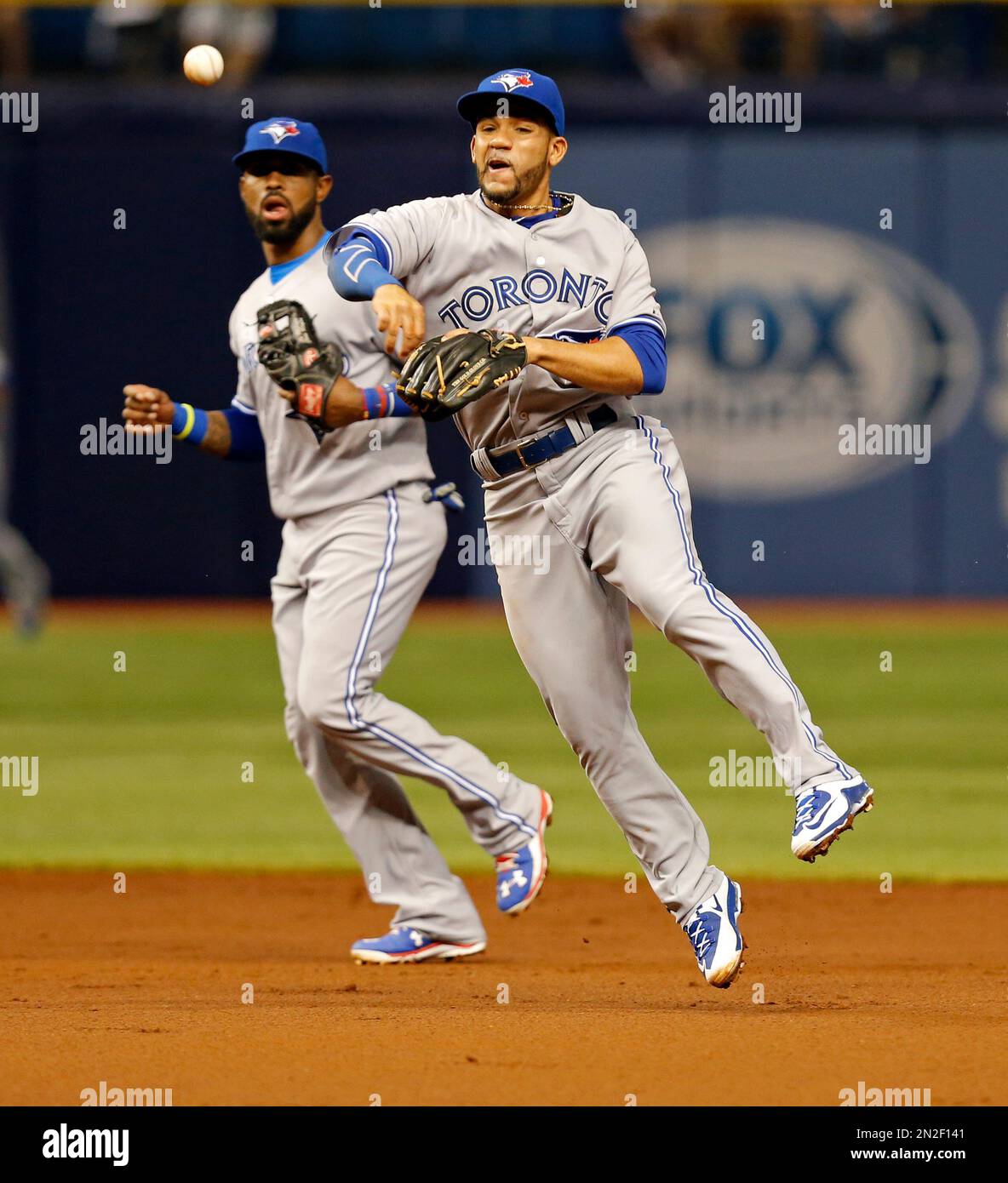 Toronto Blue Jays second baseman Devon Travis throws out Tampa Bay Rays ...