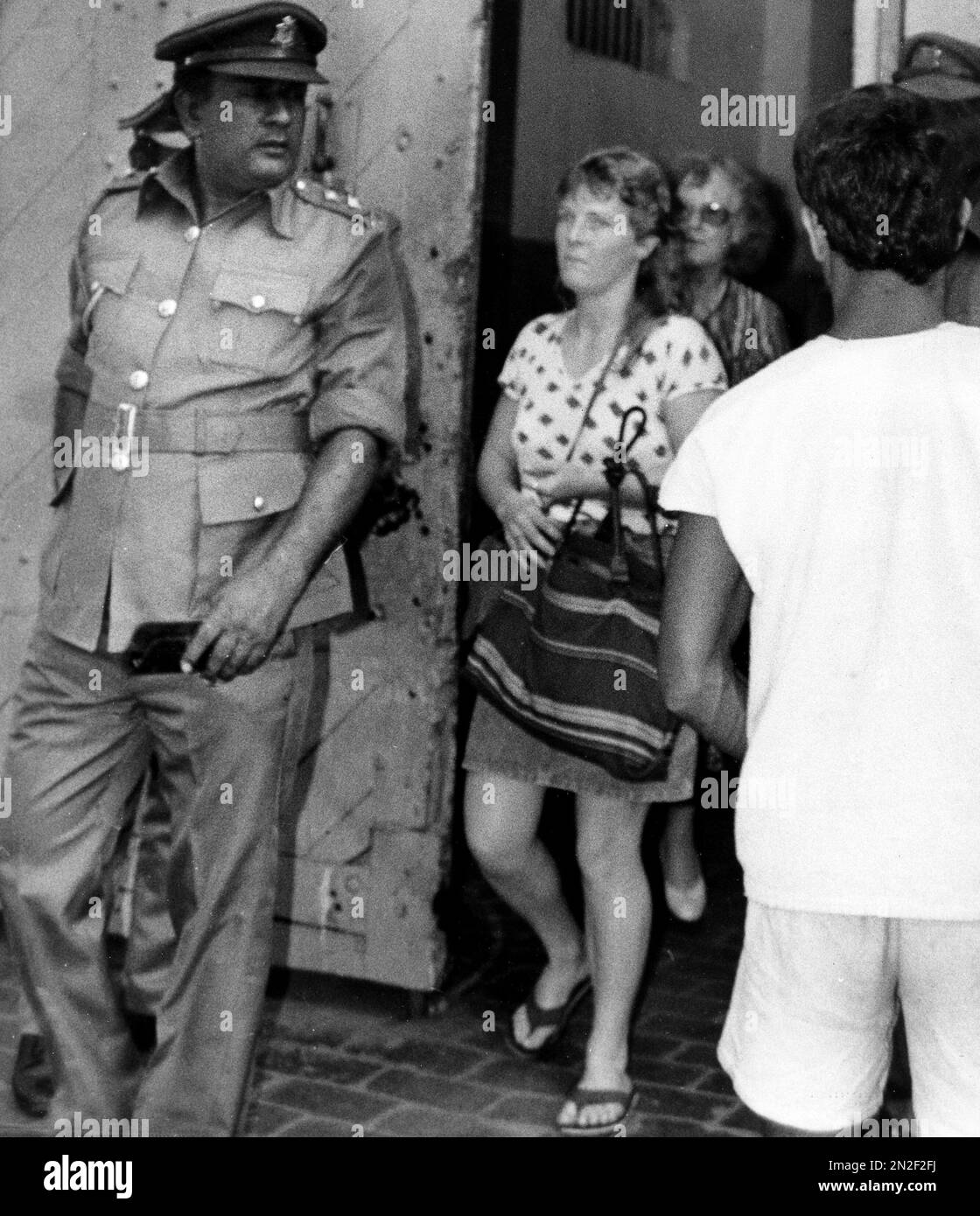 Joanne, front, and Catherine Spiers, walk out of a Colombo, Sri Lanka ...