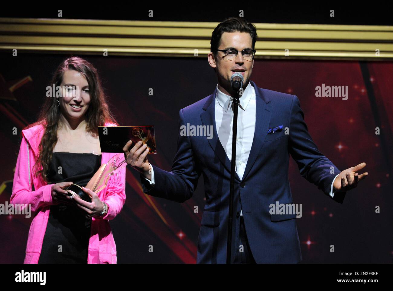 Matt Bomer, right, presents the Bricker Humanitarian award to Melissa ...