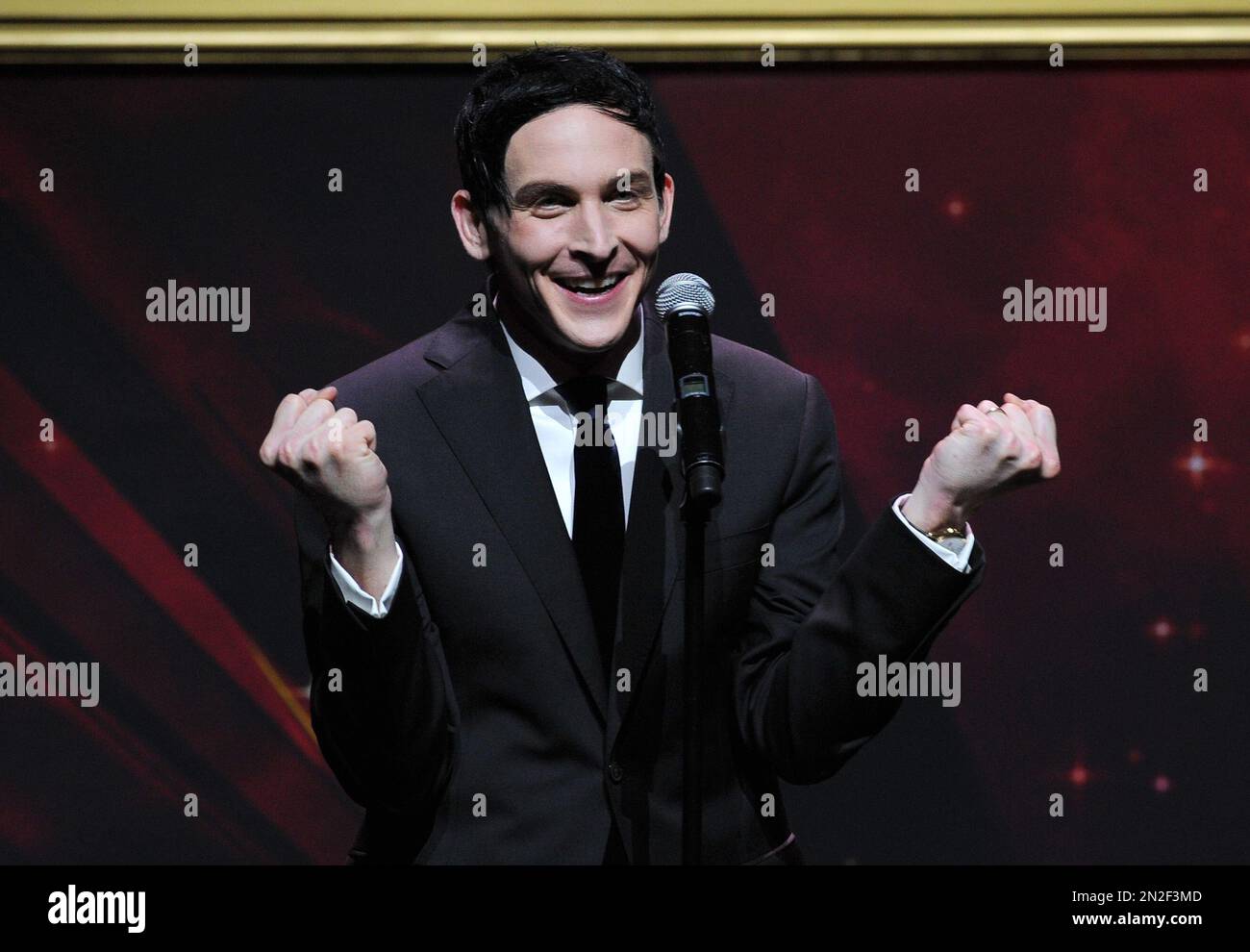 Robin Lord Taylor presents an award at the 36th College Television ...