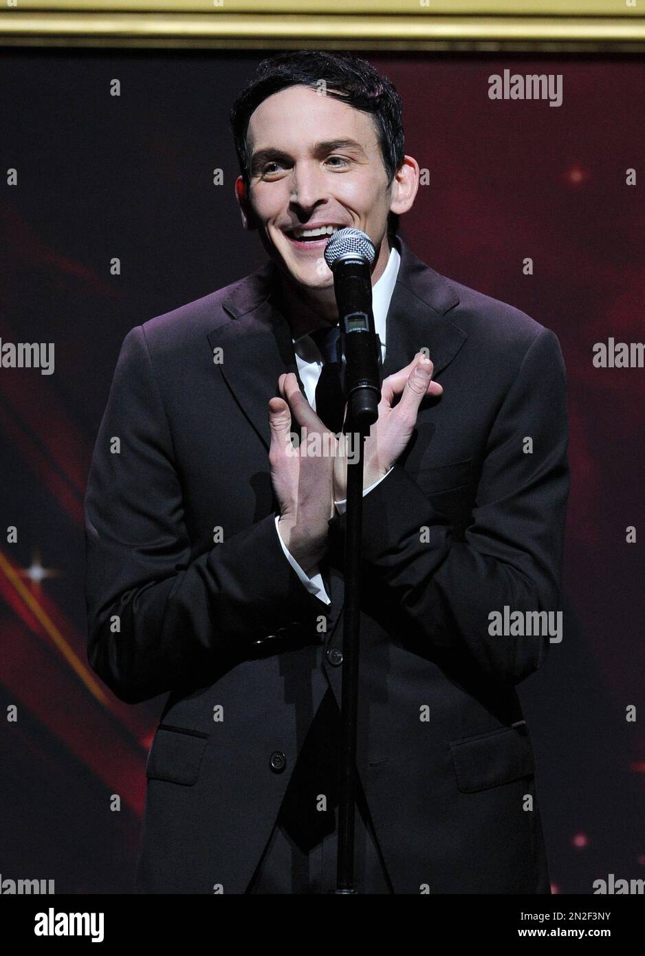 Robin Lord Taylor presents an award at the 36th College Television ...