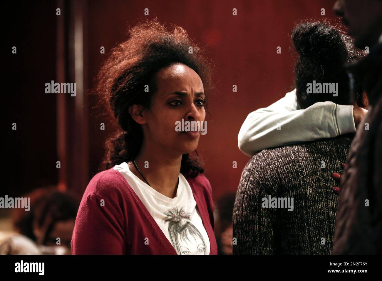 Eritrean shipwreck survivor Wegasi Nebiat, looks on after boarding a ...