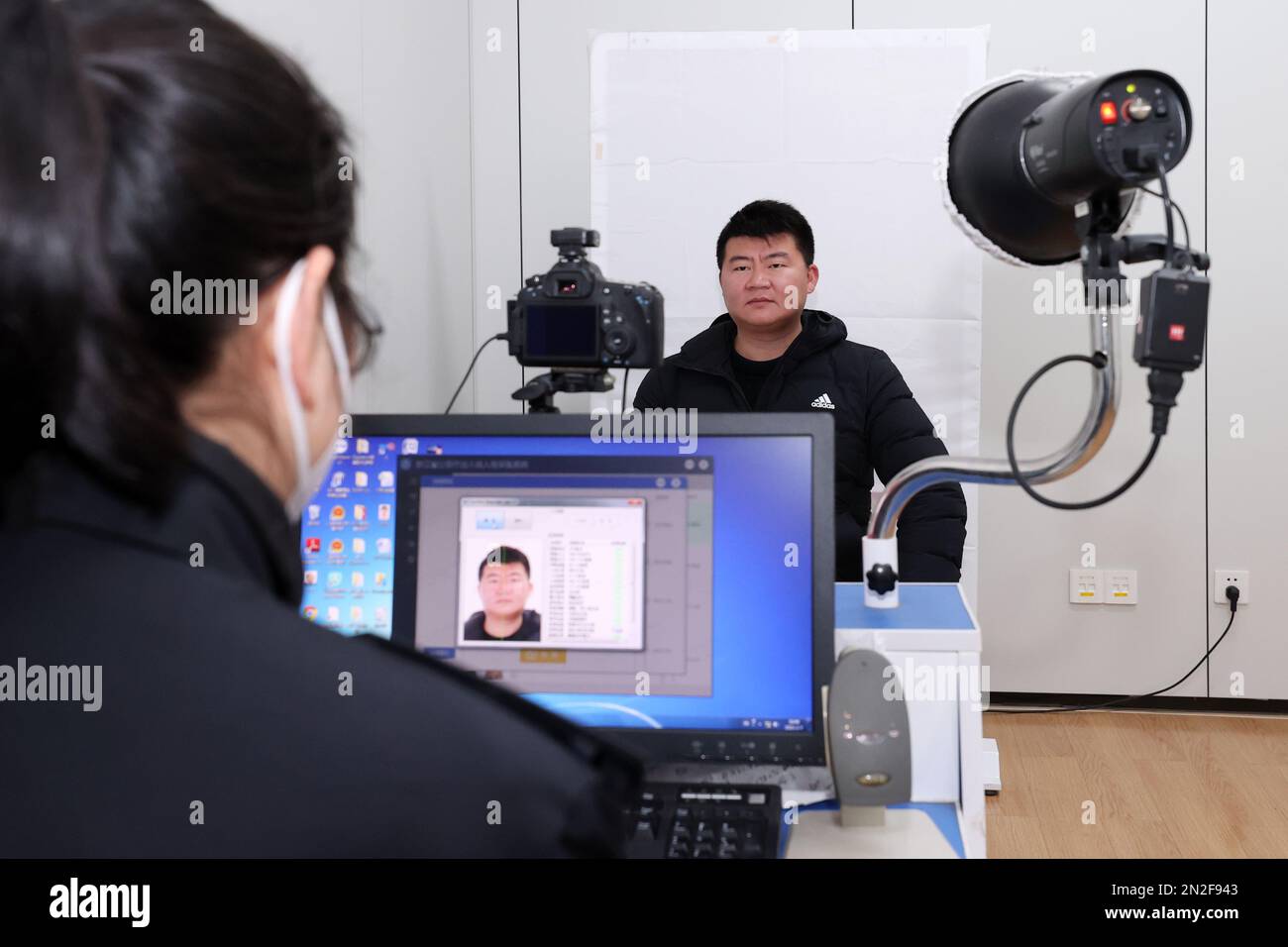 ZHOUSHAN, CHINA - FEBRUARY 7, 2023 - A staff member of the Exit and ...