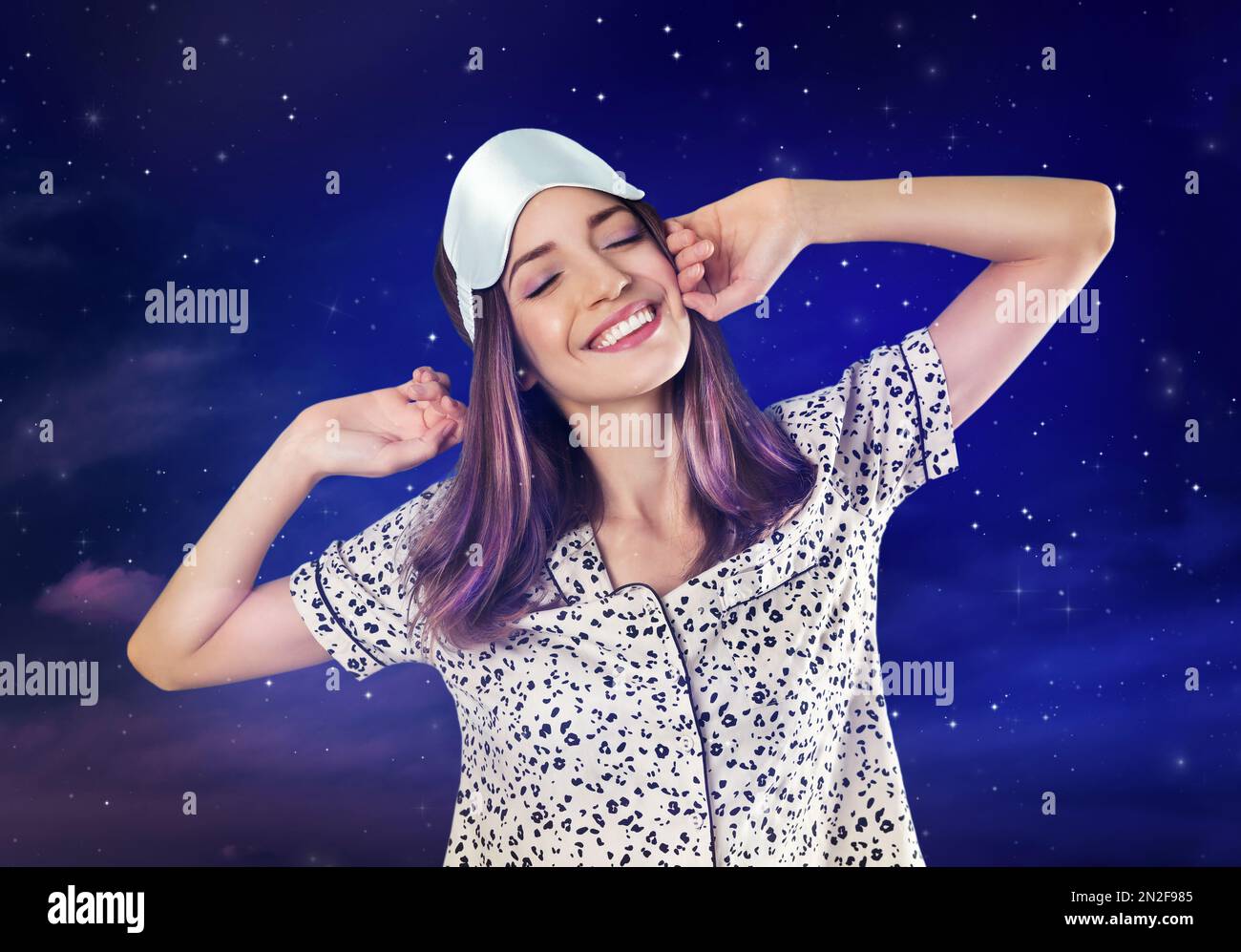 Beautiful woman and night starry sky on background. Bedtime Stock Photo ...