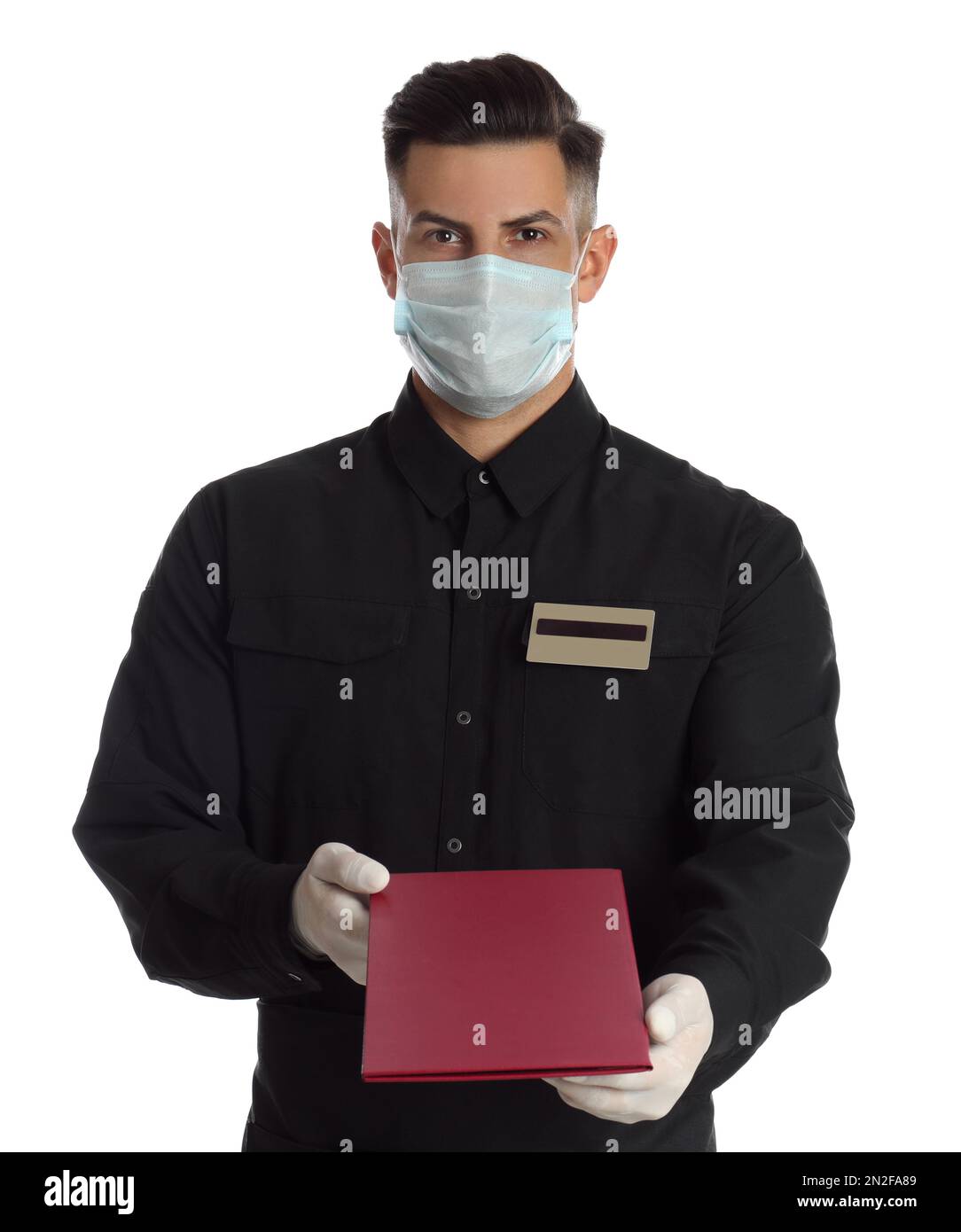 Waiter in medical face mask with menu on white background Stock Photo ...