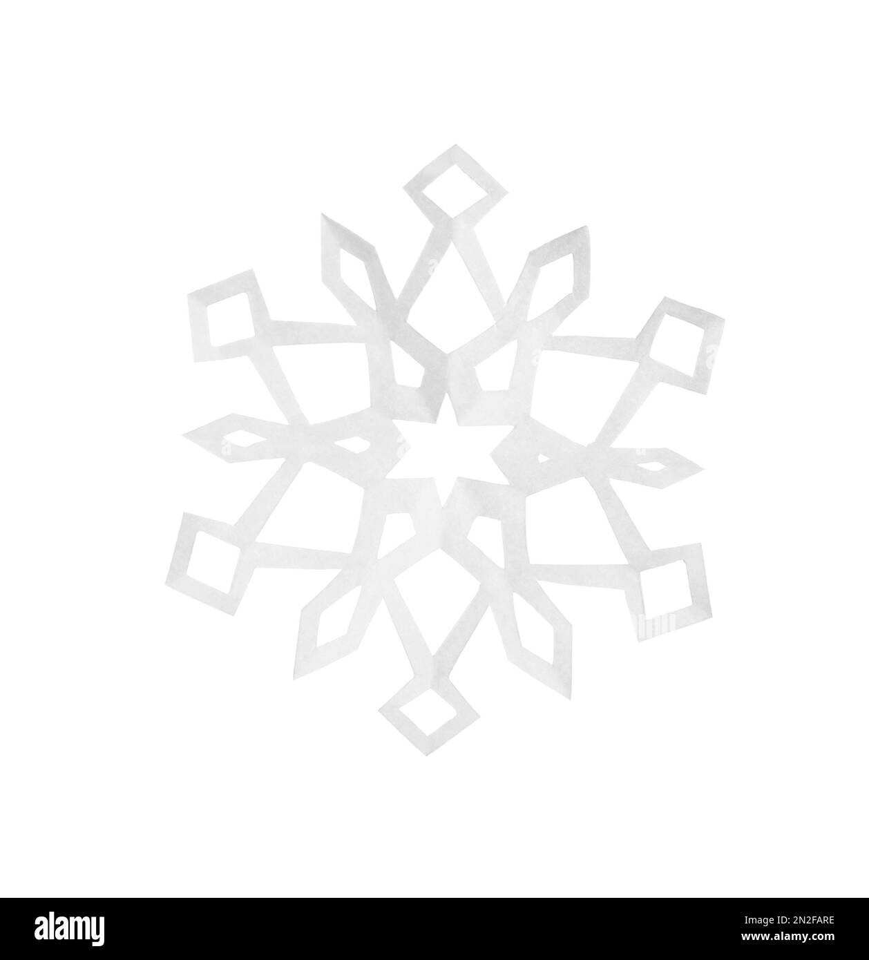 Beautiful snowflake made of paper isolated on white Stock Photo - Alamy