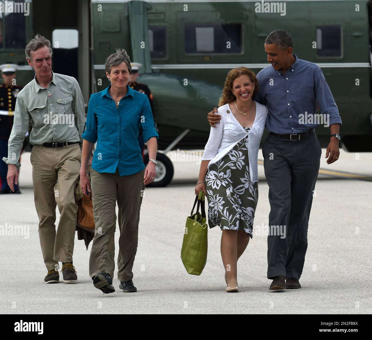 President Barack Obama walks with Rep. Debbie Wasserman Schultz, D-Fla ...