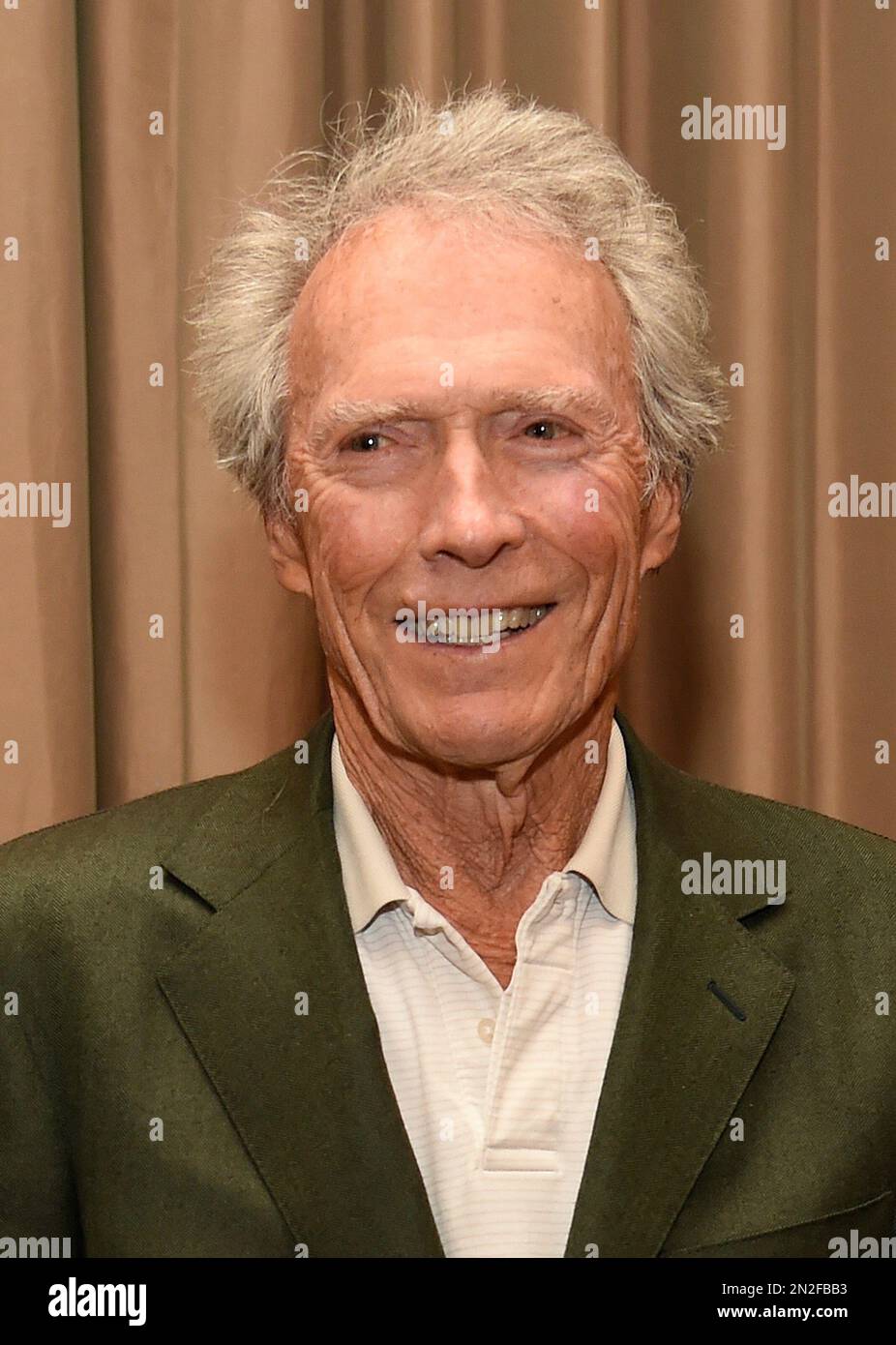 Filmmaker Clint Eastwood poses for a photo op before "The Legend of ...