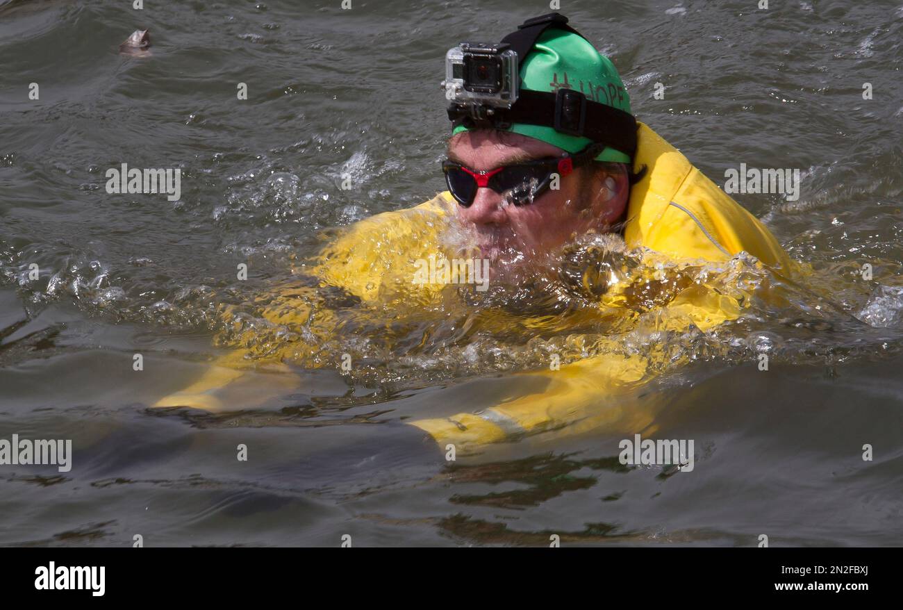 Clean-water advocate Christopher Swain swims in the Gowanus Canal in ...