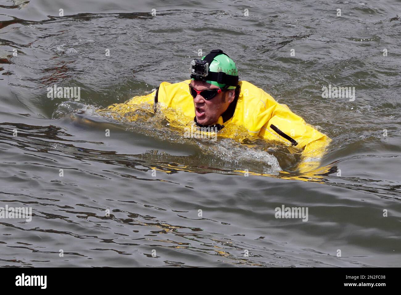 Clean-water advocate Christopher Swain swims the Gowanus Canal, in the ...