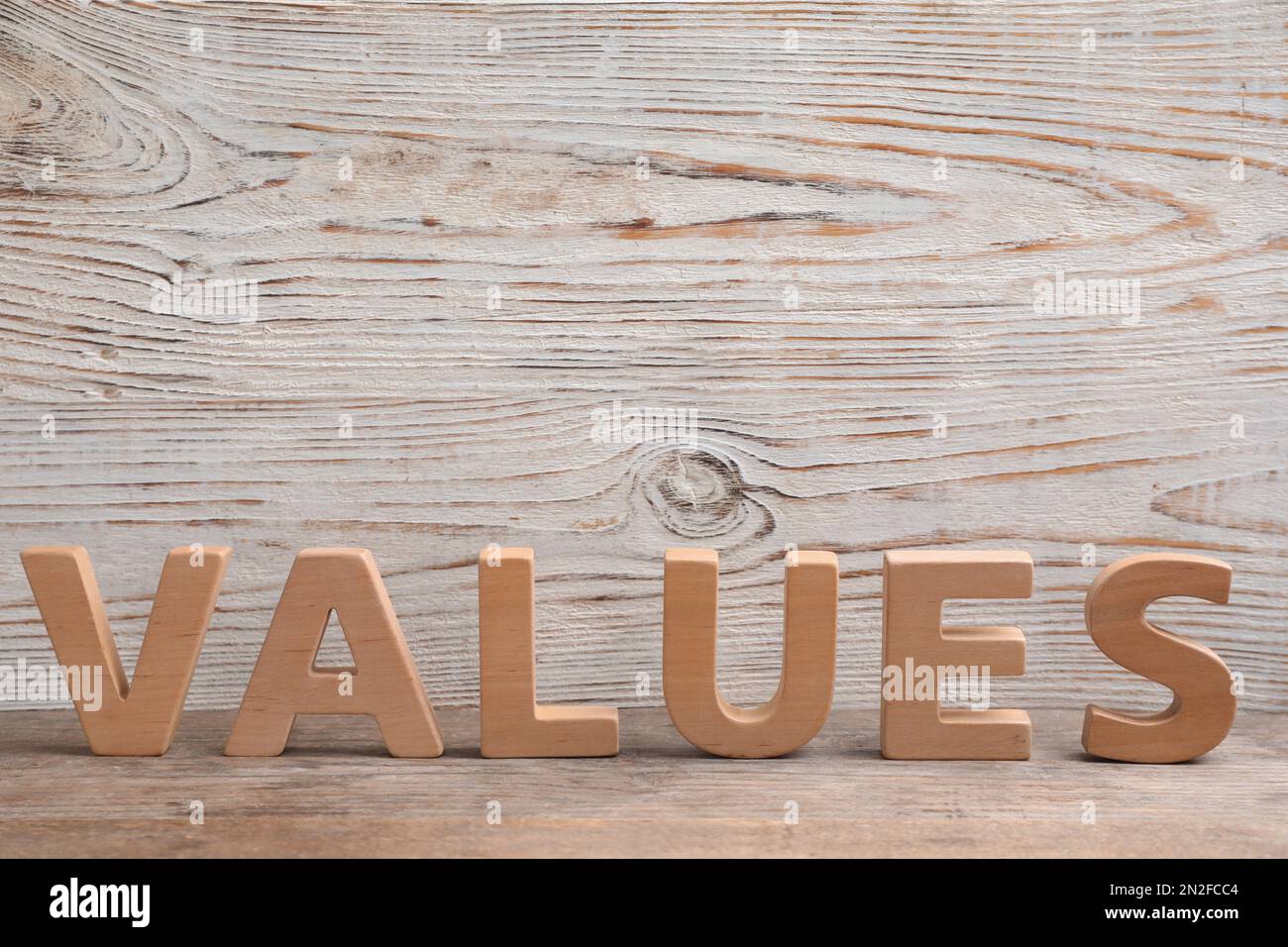 Word values made wooden hi-res stock photography and images - Alamy