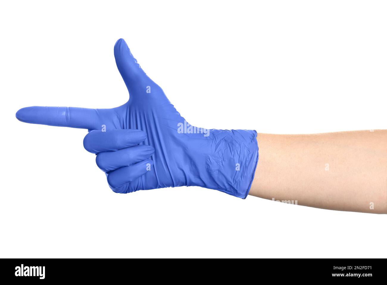 Woman in blue latex gloves pointing at something on white background ...