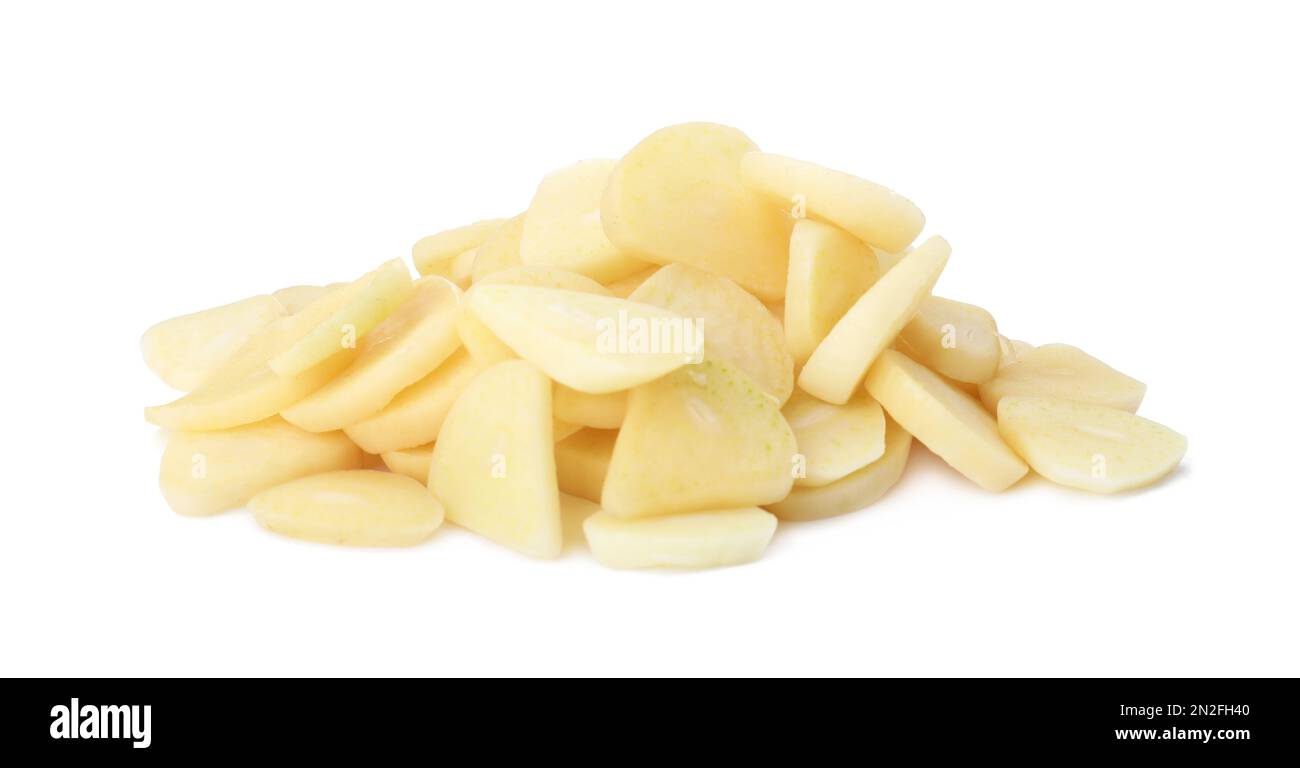 Pile of fresh sliced garlic cloves isolated on white. Organic food ...