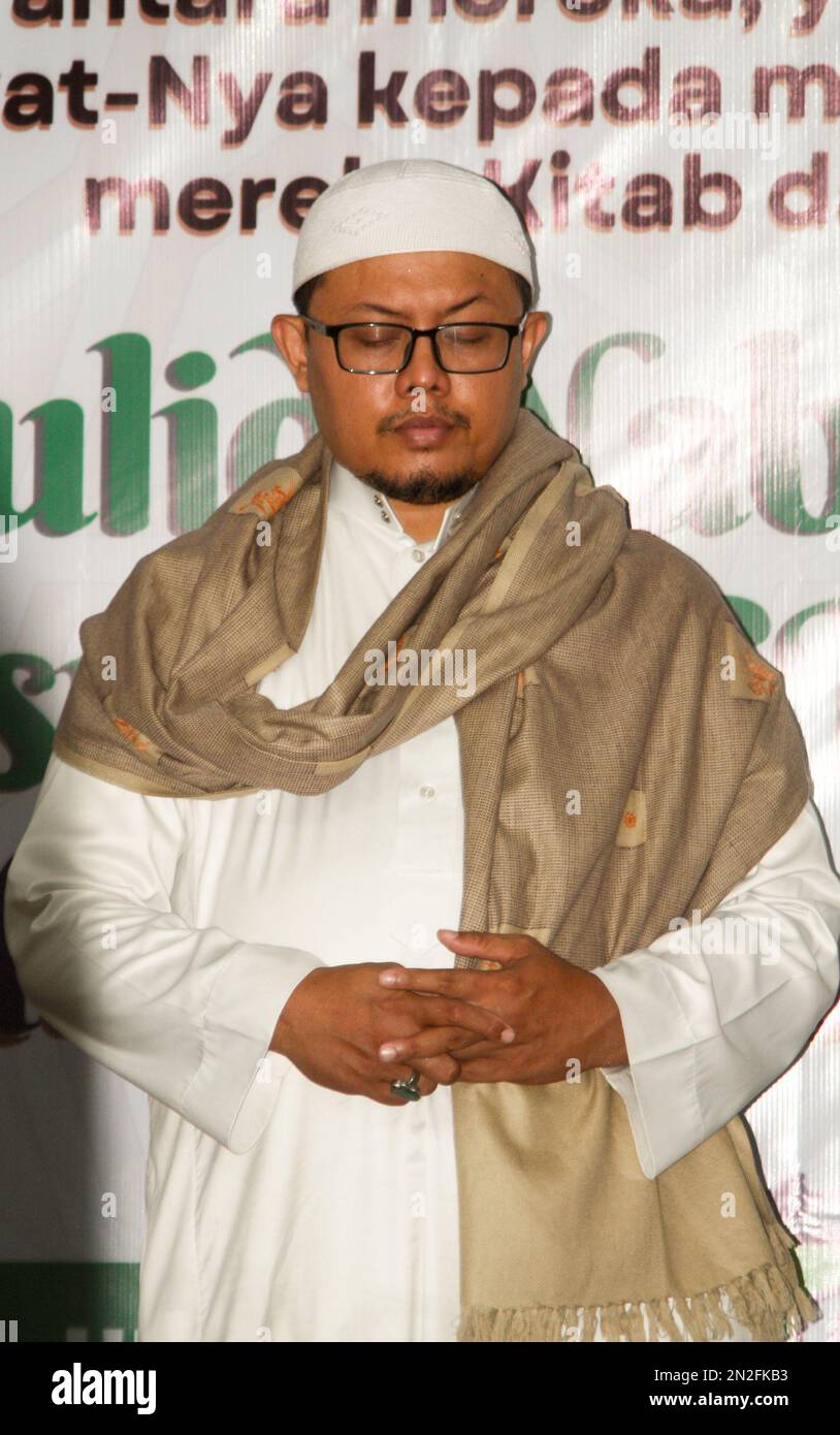 A vertical shot of an ustadz during an Indonesian Islamic event Stock ...