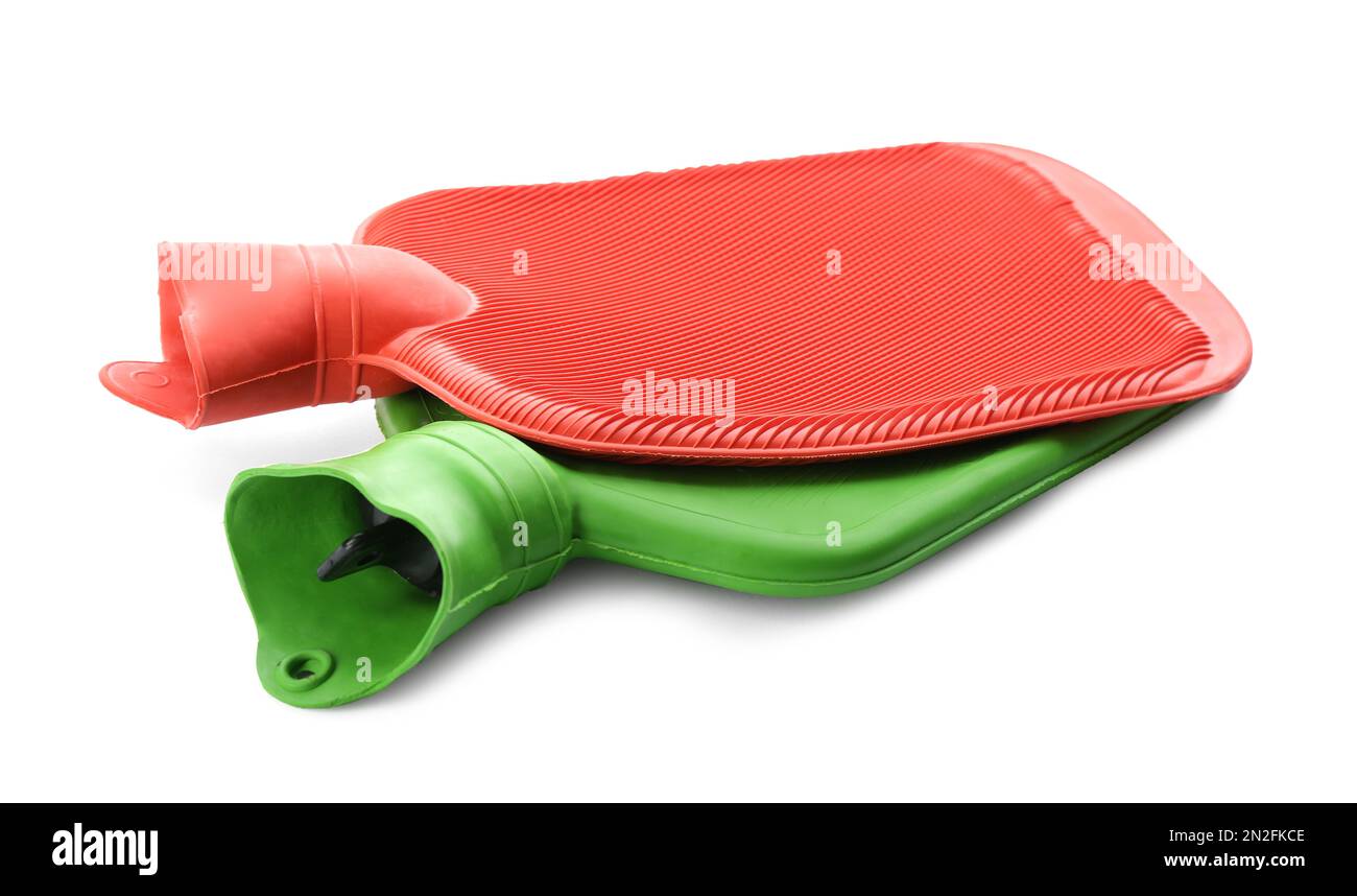 Rubber hot water bottles isolated on white Stock Photo - Alamy