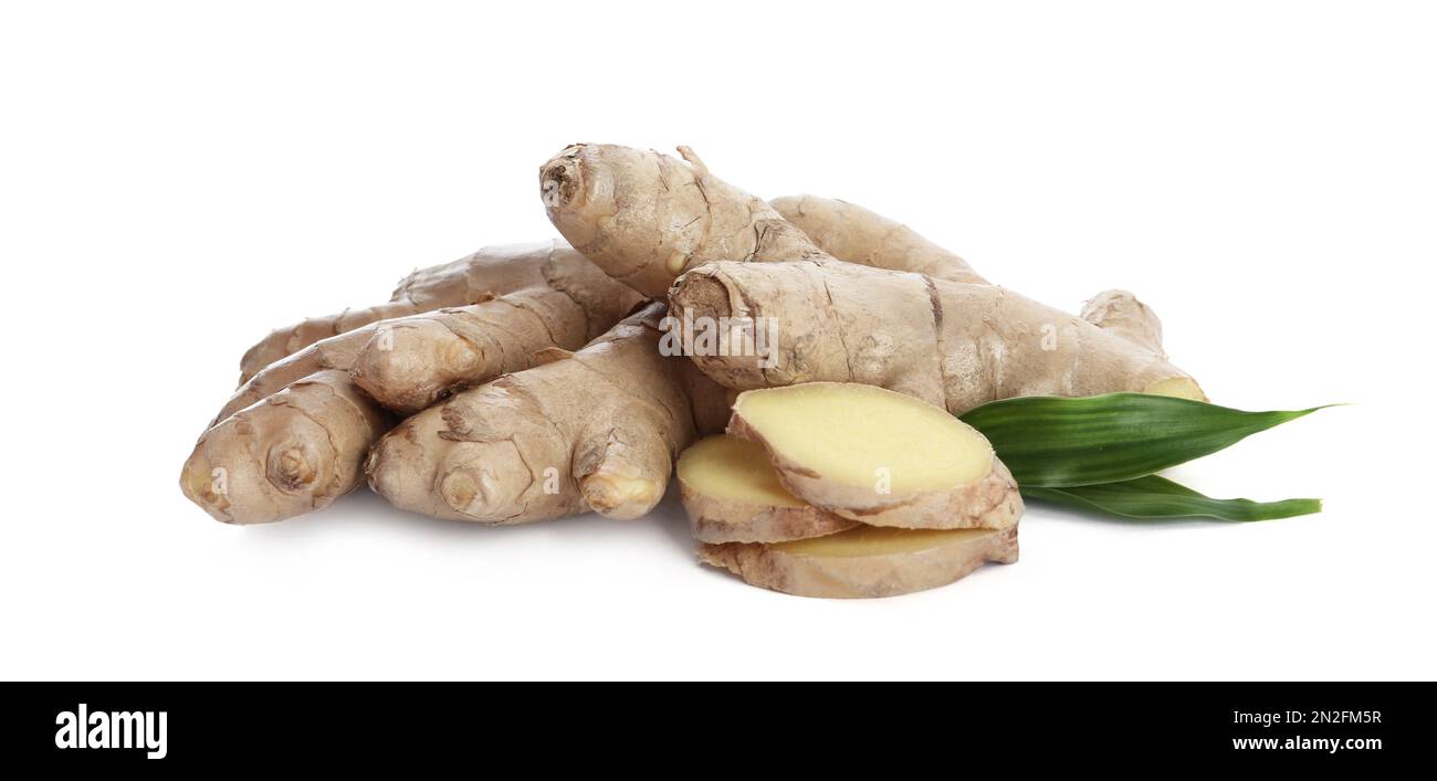Whole and cut fresh ginger with leaves isolated on white Stock Photo ...