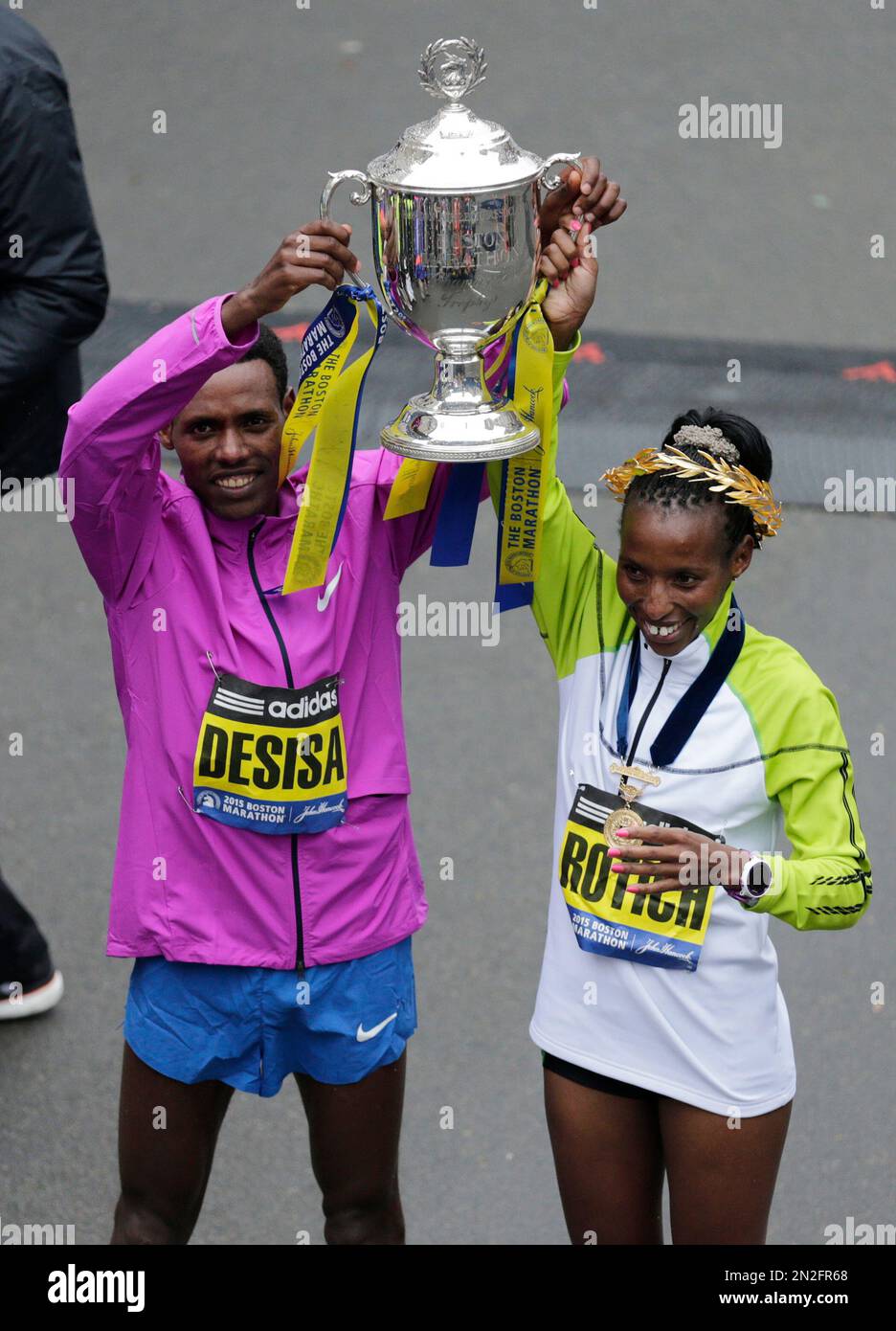 Boston Marathon winner Lelisa Desisa, left, of Ethiopia, and women's ...